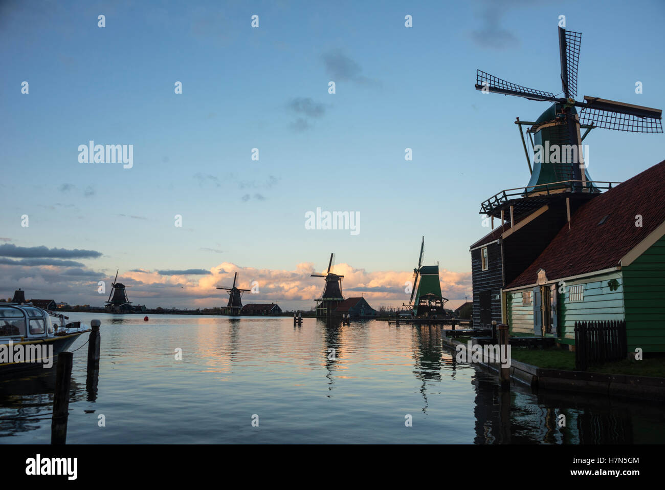 Dutch windmills on the dyke Zaandam classic Dutch scene Stock Photo - Alamy