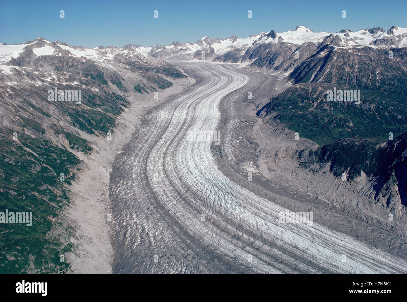 Glacier flowing between the Chigmit Mountains showing glacial valley ...