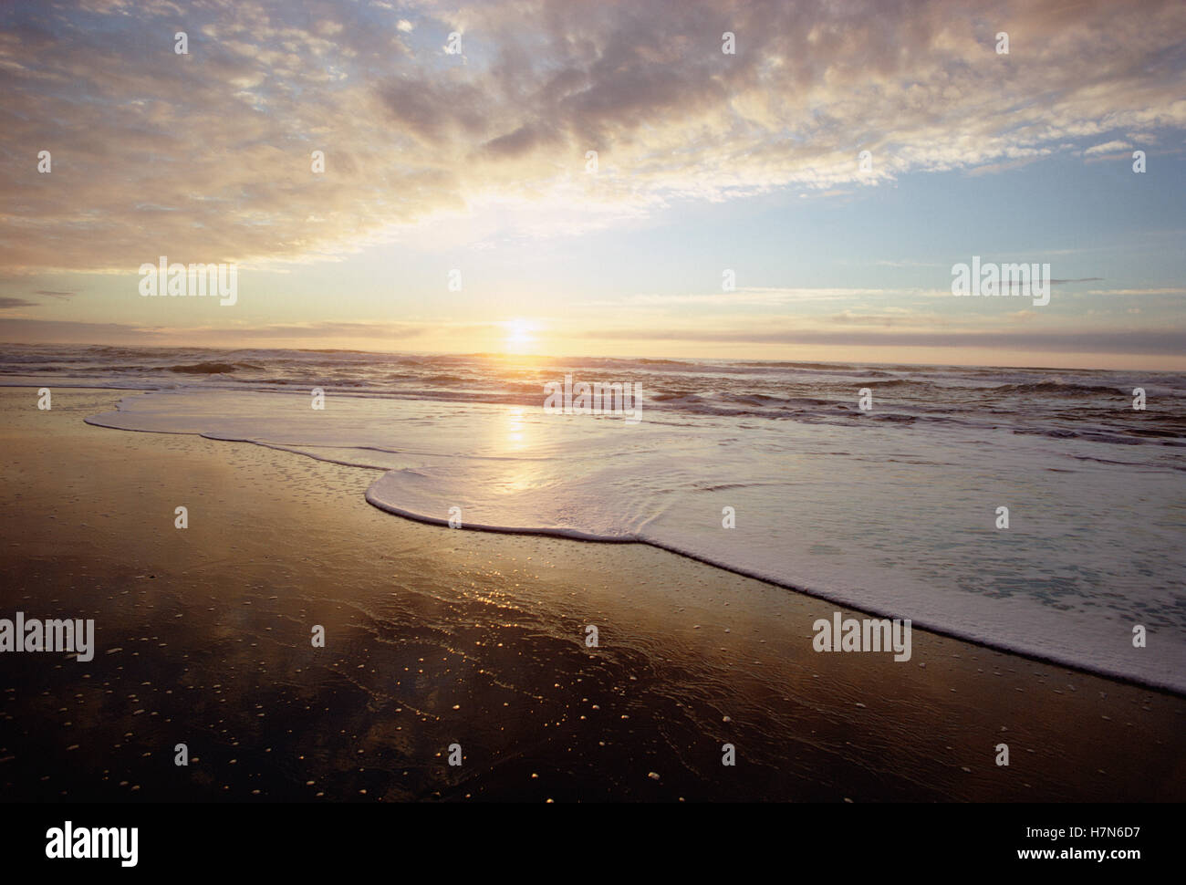 Sunset over beach, Oregon Stock Photo - Alamy