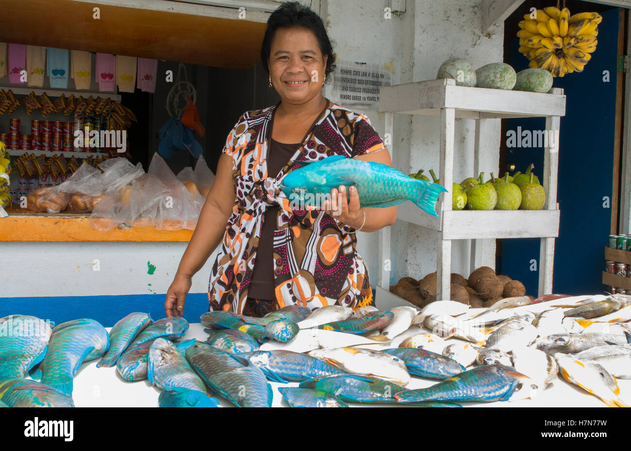 Pohnpei Micronesia woman selling fresh fish at market on stand model ...