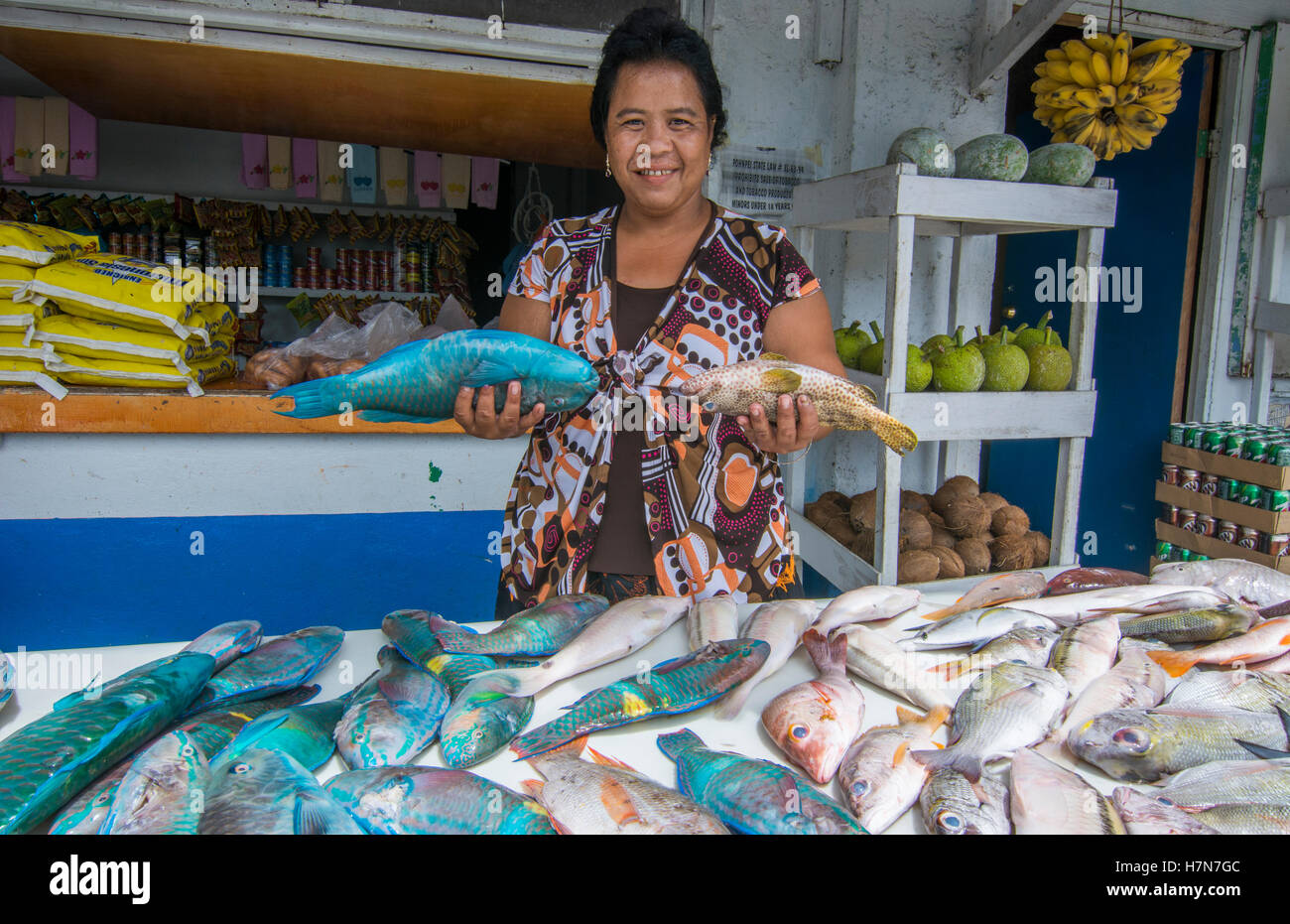 Pohnpei Micronesia woman selling fresh fish at market on stand model ...
