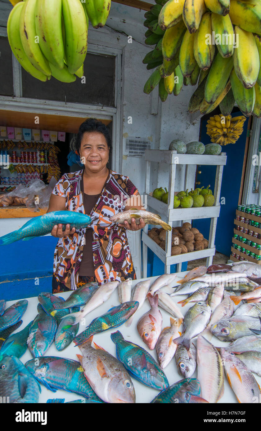Pohnpei Micronesia woman selling fresh fish at market on stand model ...