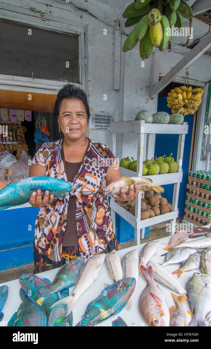 Pohnpei Micronesia woman selling fresh fish at market on stand model ...