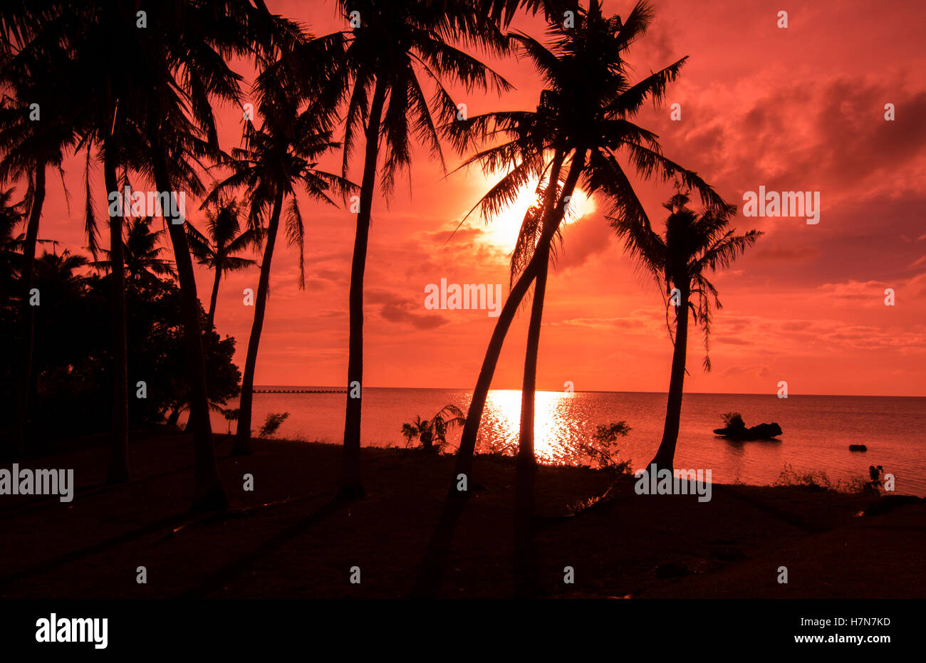 Guam USA Territory sunset with palms and ocean and boats Stock Photo ...
