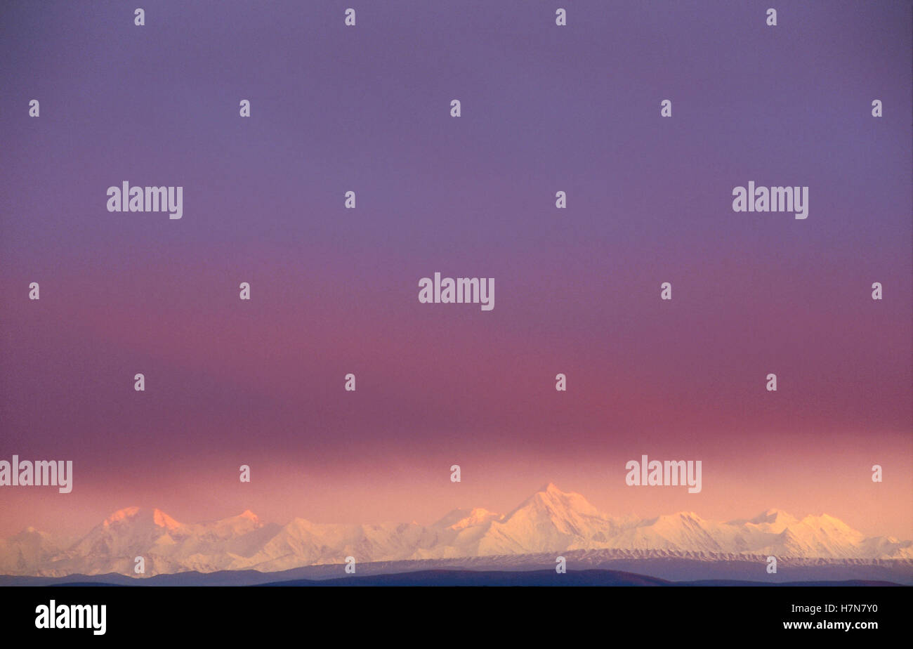 Pink skies over mountain range, Alaska Stock Photo - Alamy