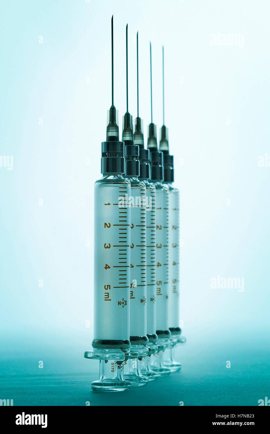 row of medical syringes Stock Photo - Alamy
