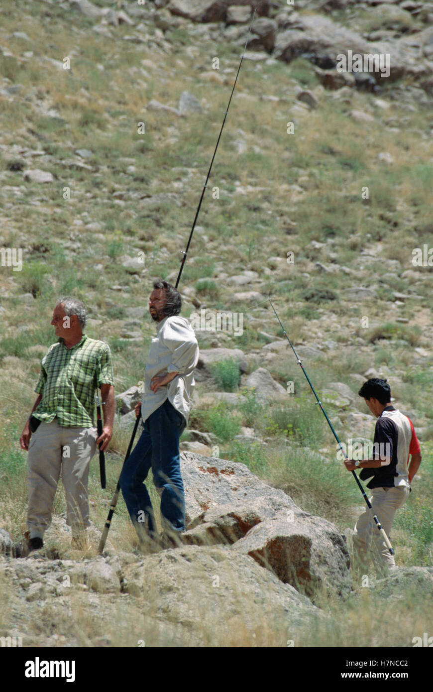 Researchers Bob Macey, Ted Papenfuss and Hadi Fahini with fishing poles ...