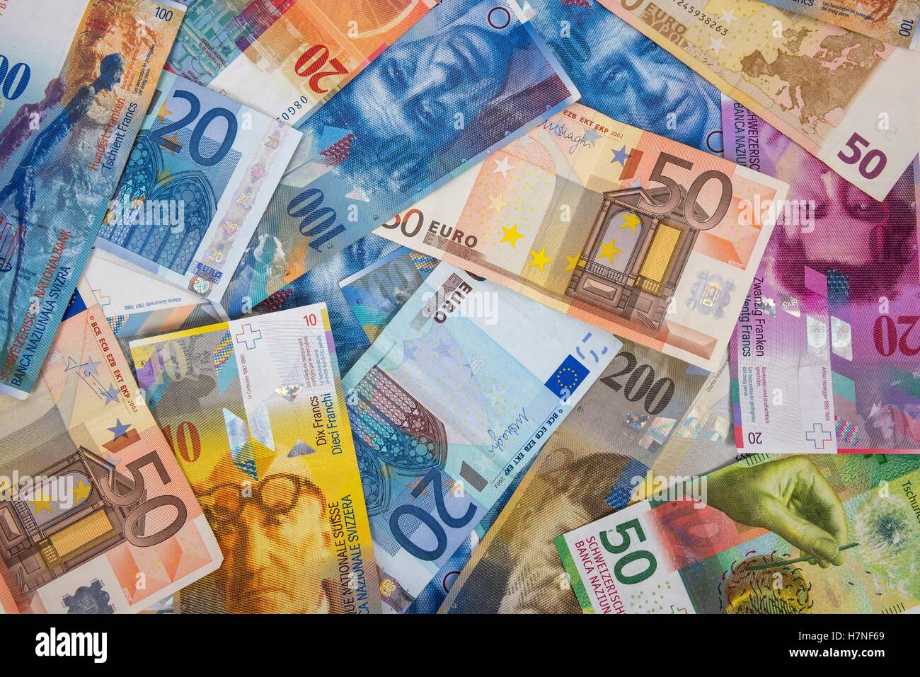 Background made of euro and swiss franc banknotes Stock Photo - Alamy