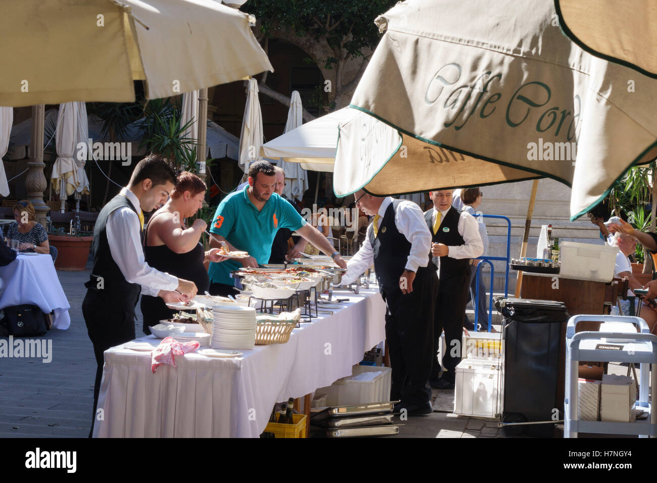 Valletta, walled capital city port of Malta. Outdoor buffet served by ...
