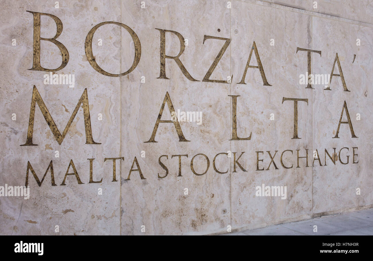 Valletta, walled capital city port of Malta. Malta Stock Exchange sign ...