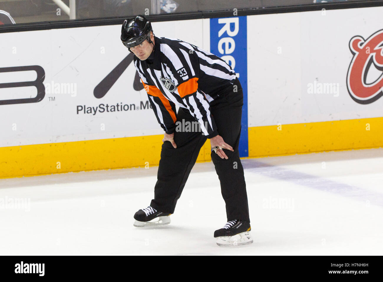 Feb 8, 2012; San Jose, CA, USA; NHL referee Kevin Pollock (33) before a ...