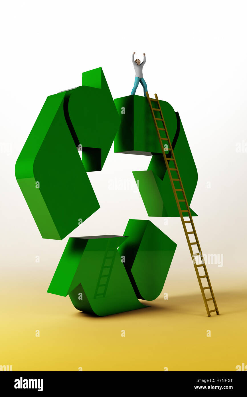 man standing ontop of recycle symbol Stock Photo - Alamy
