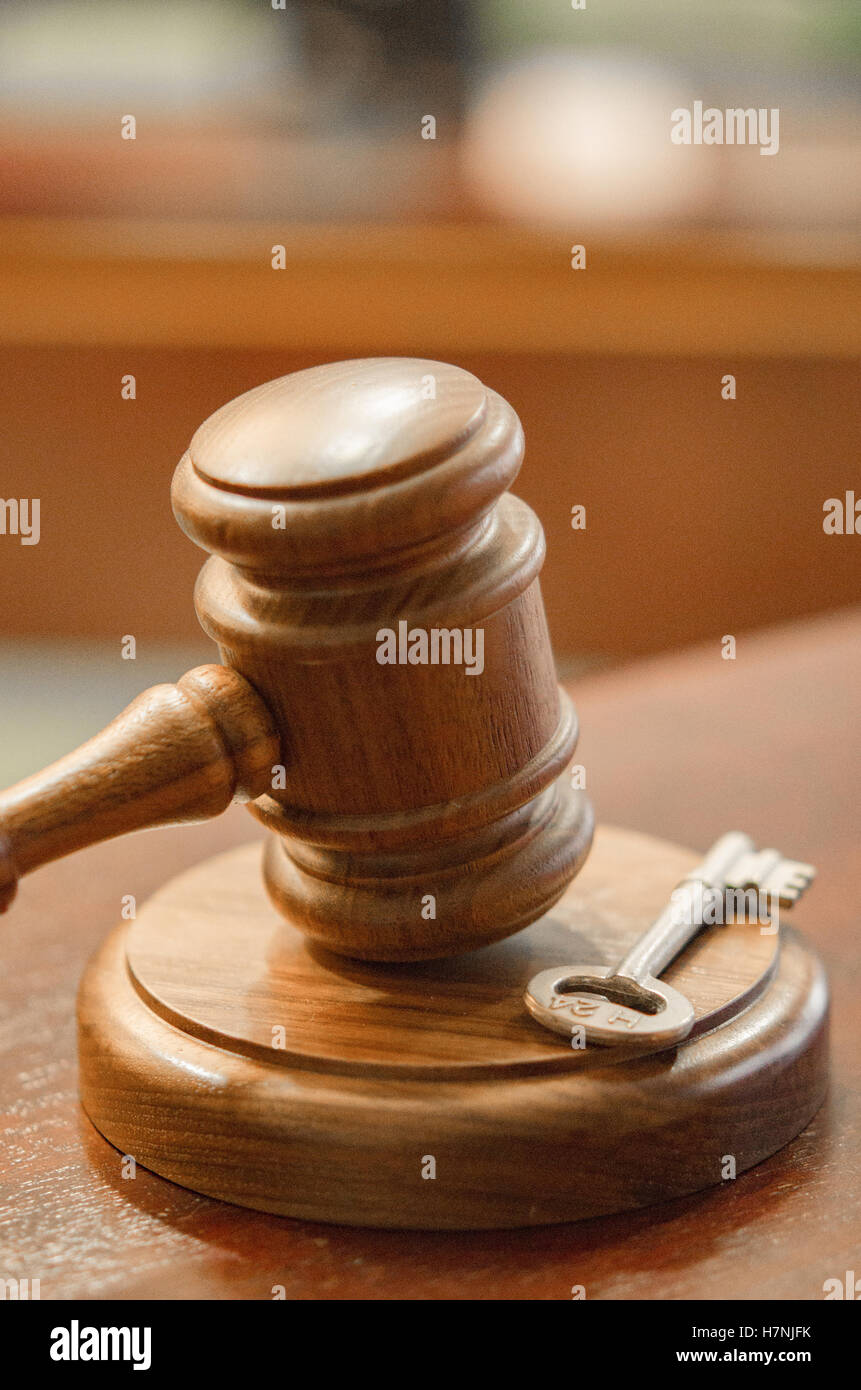 Auction, key and gavel, in Courtroom. Concept photograph of home ...