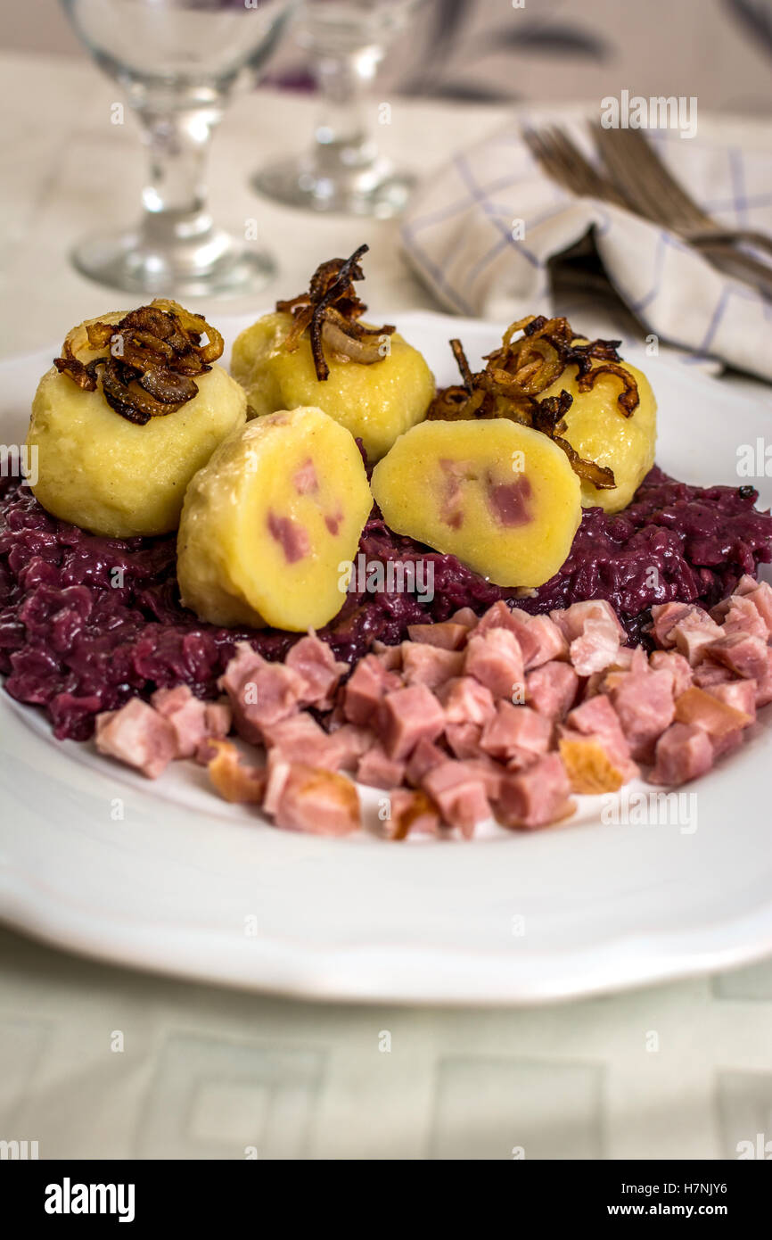 Traditional czech cuisine dumpling with smoked meat and onion Stock ...