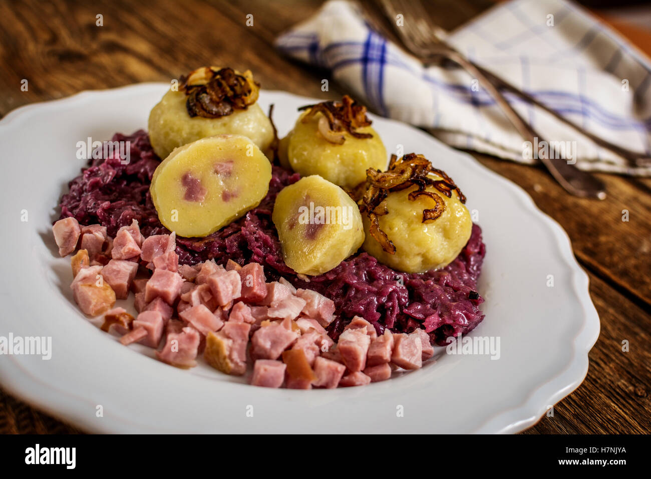 Traditional czech cuisine dumpling with smoked meat and onion Stock ...