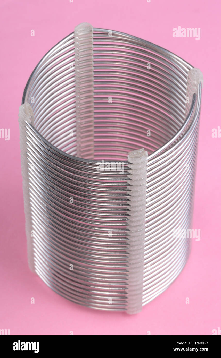 radio coil on pink background Stock Photo - Alamy