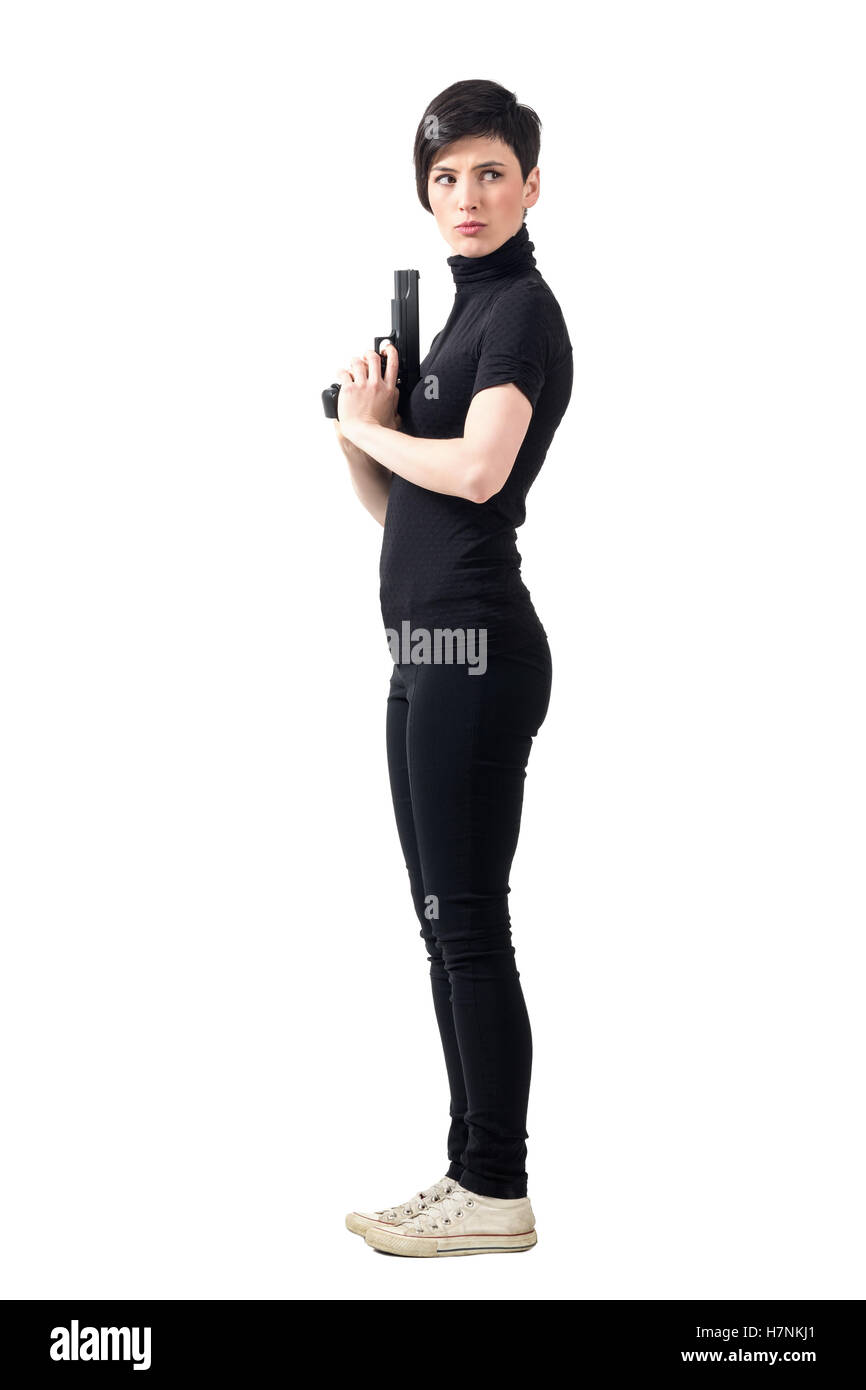 Woman holding gun back High Resolution Stock Photography and Images - Alamy