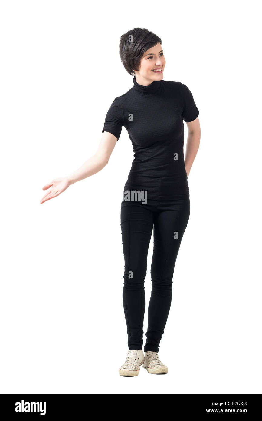 Friendly smiling feminine elegant woman inviting and welcoming. Full ...