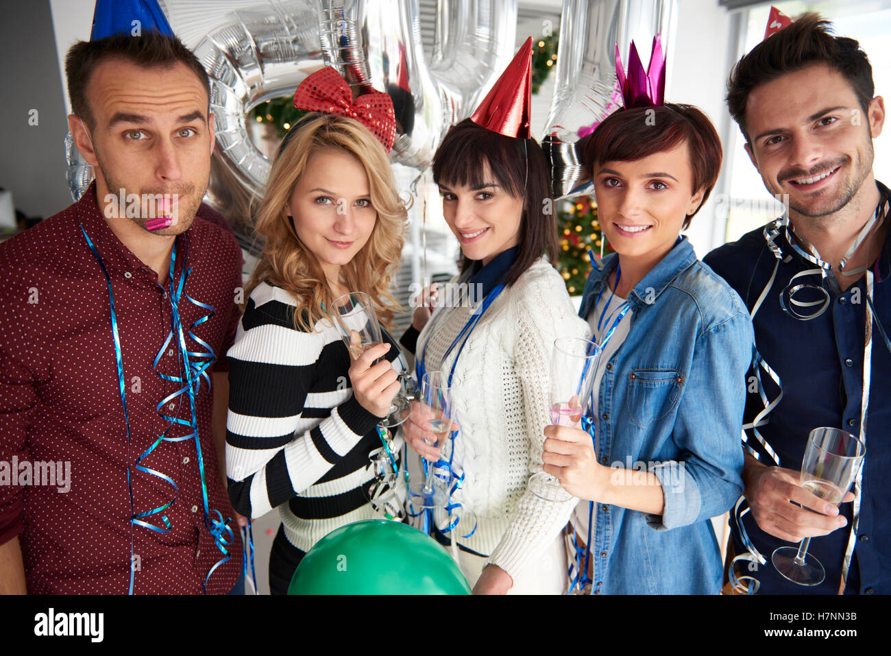 Portrait of coworkers at office party Stock Photo - Alamy