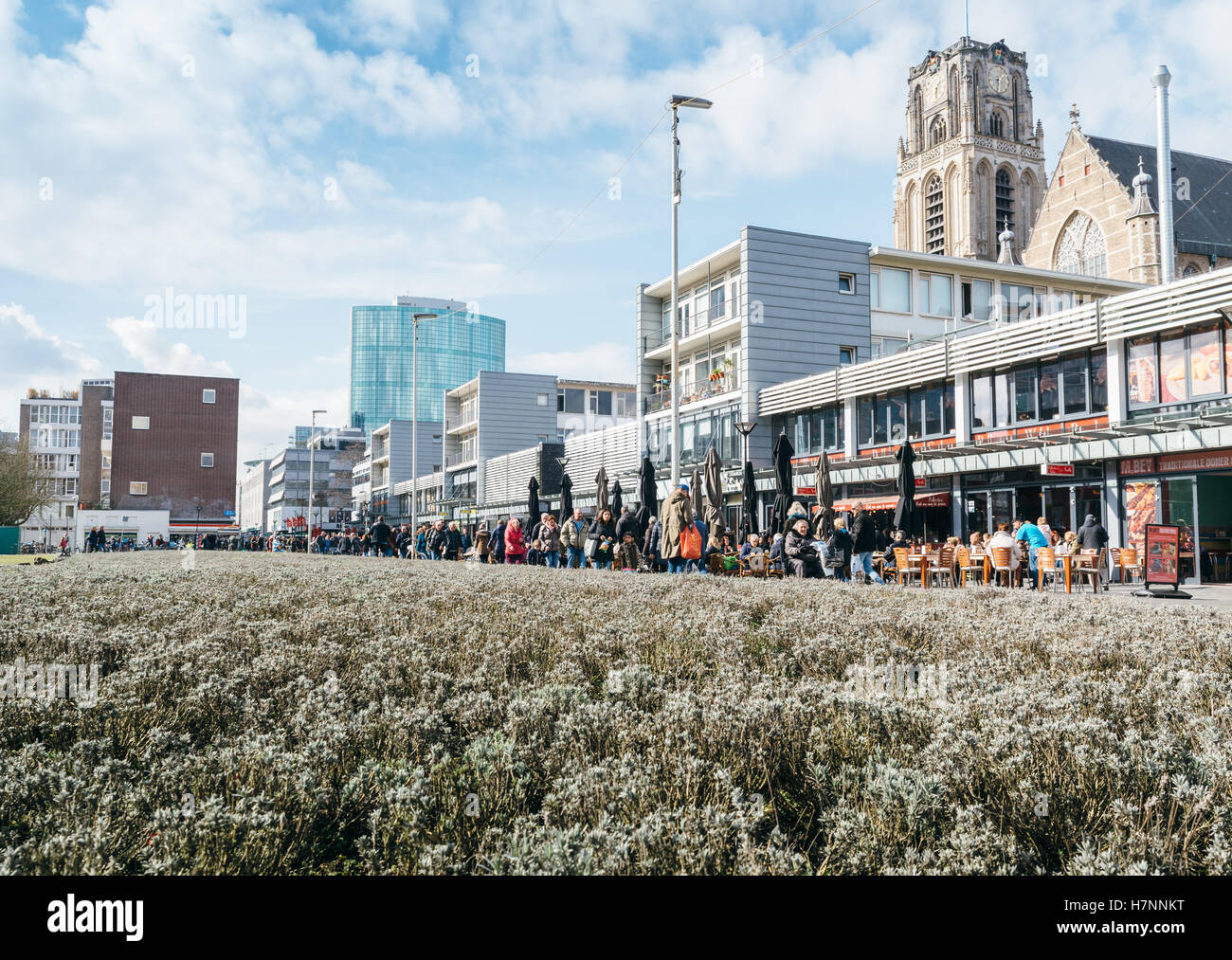 People visit shops near the Grotekerk (Big church) in Rotterdam ...