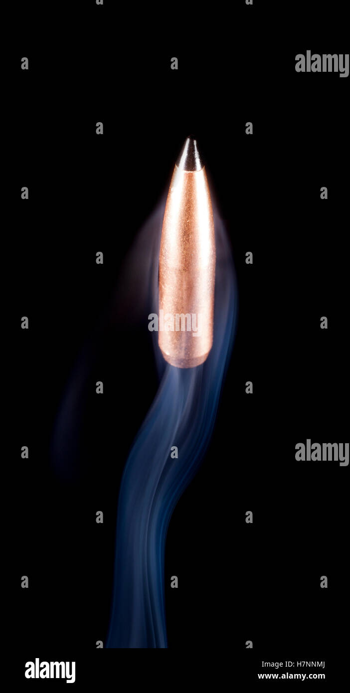 Bullet with copper plating and polymer tip that looks like it is rising ...