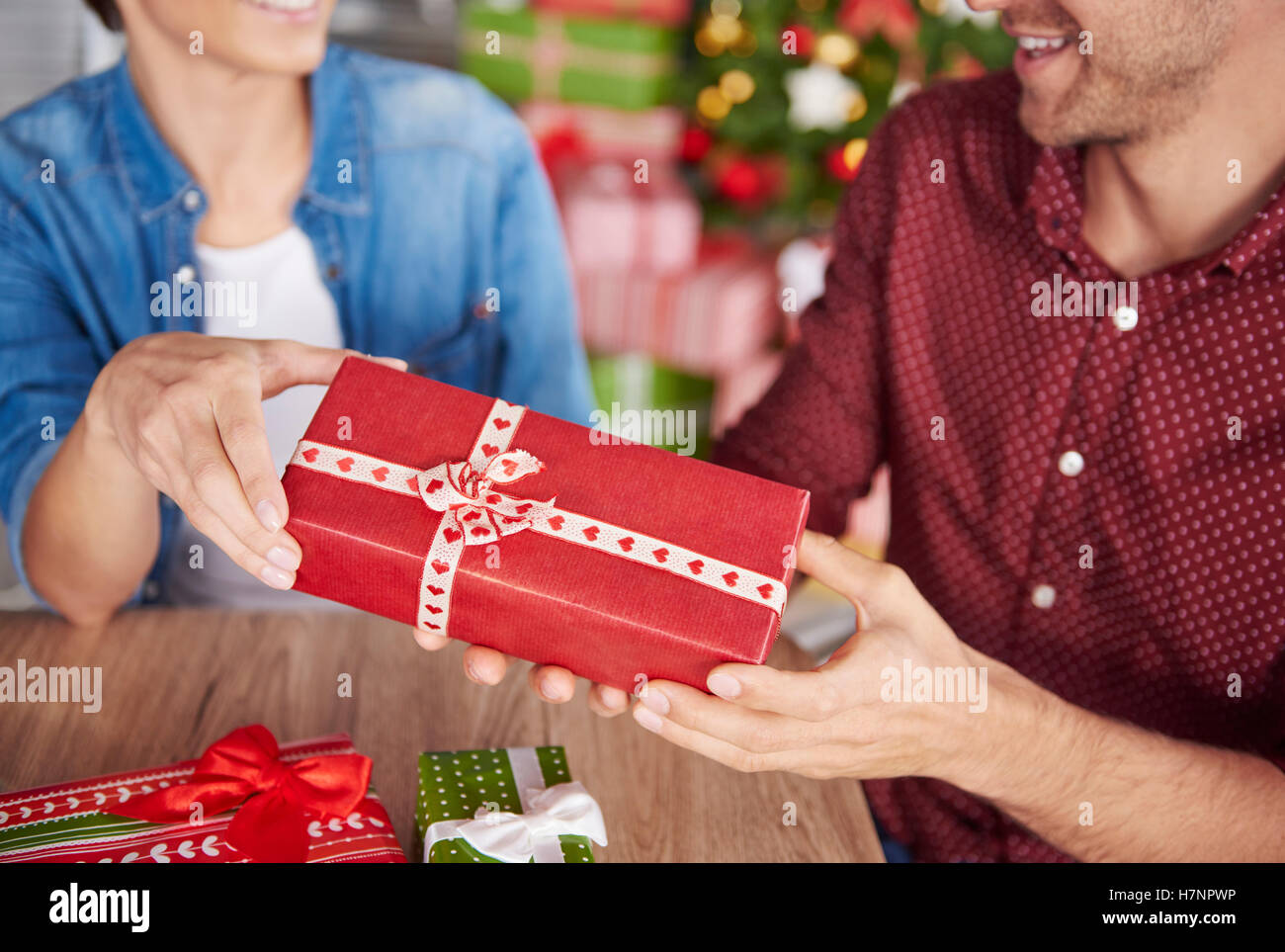 Sharing handing hi-res stock photography and images - Alamy