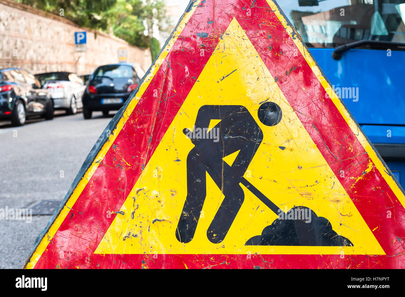 Road signs in a street under reconstruction symbol Stock Photo - Alamy