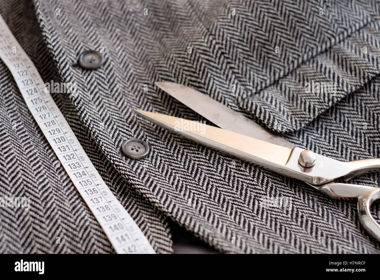 Tailor tools isolated on textile background Stock Photo - Alamy