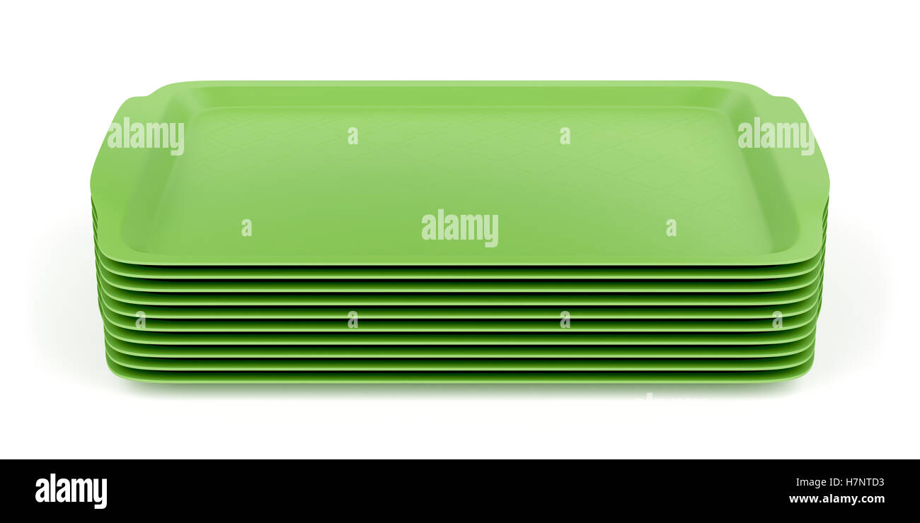 Group of green plastic trays on white background Stock Photo - Alamy