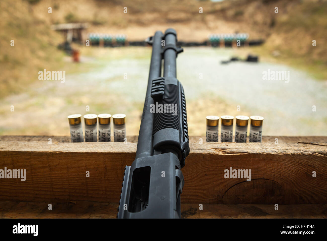 Pump gun. Close up of the pump-action rifle of 12 caliber with the ...