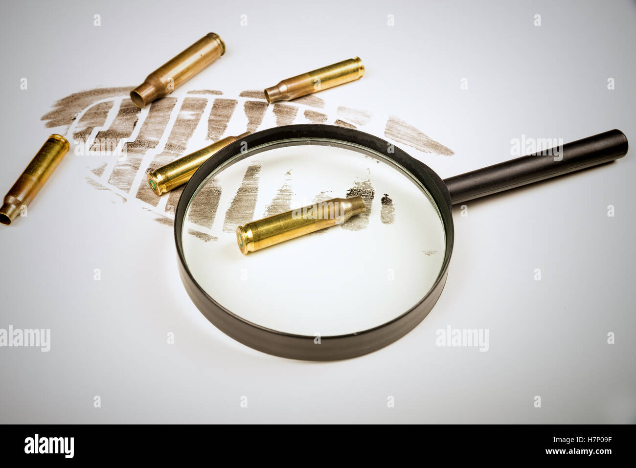 Footprint and bullet shells on a crime scene, a concept Stock Photo - Alamy