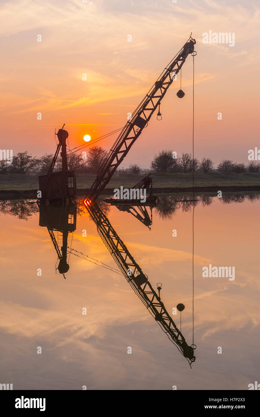 Sunken crane on old gravel workings at Cliffe marshes near gravesend ...