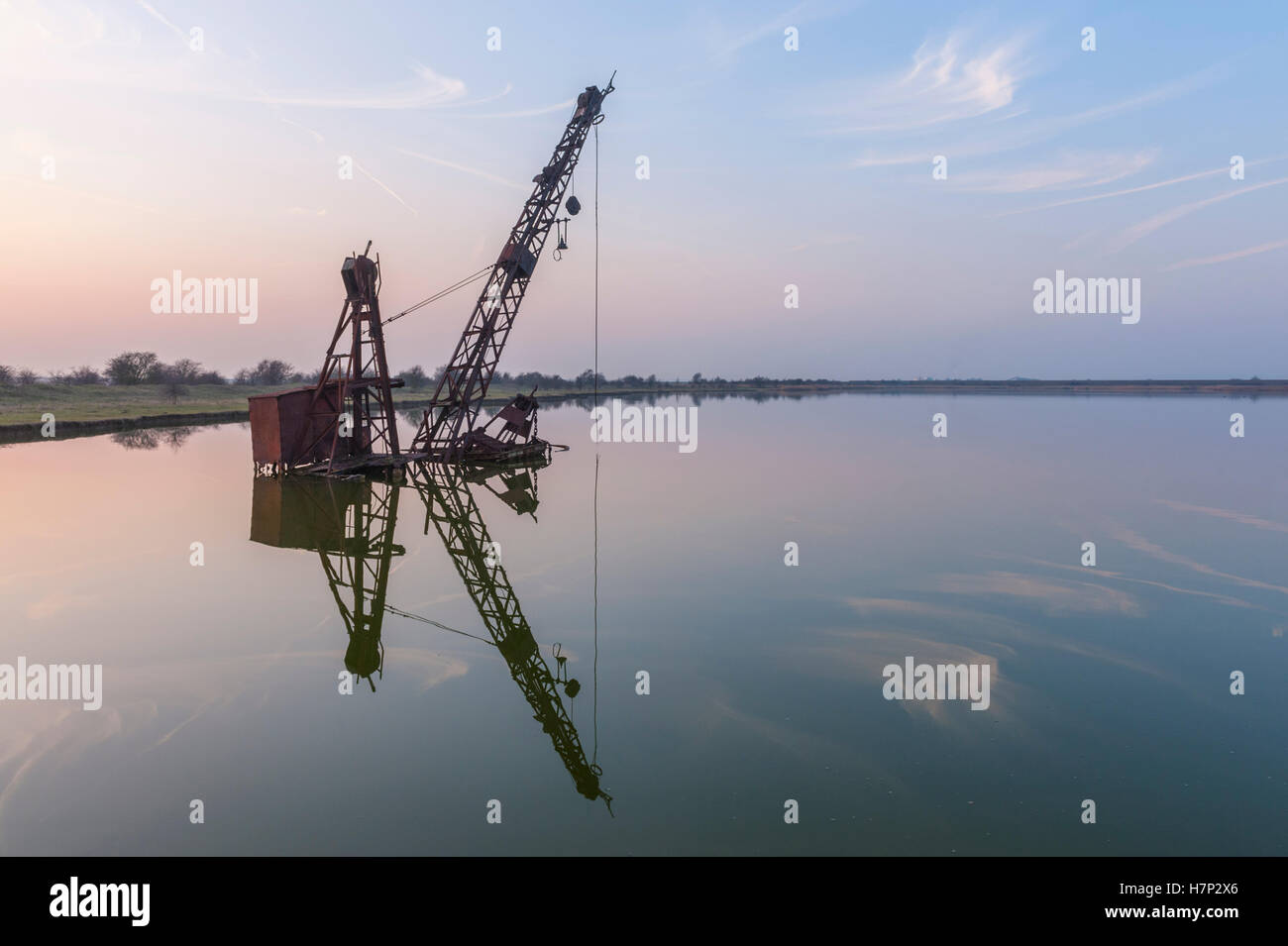 Sunken crane on old gravel workings at Cliffe marshes near gravesend ...