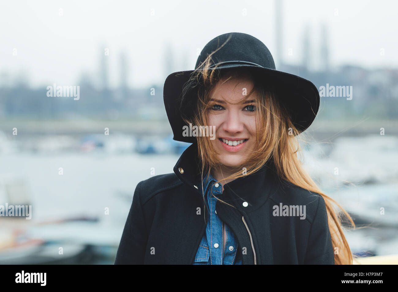 beautiful woman in warm clothing closeup portrait riverside Stock Photo ...