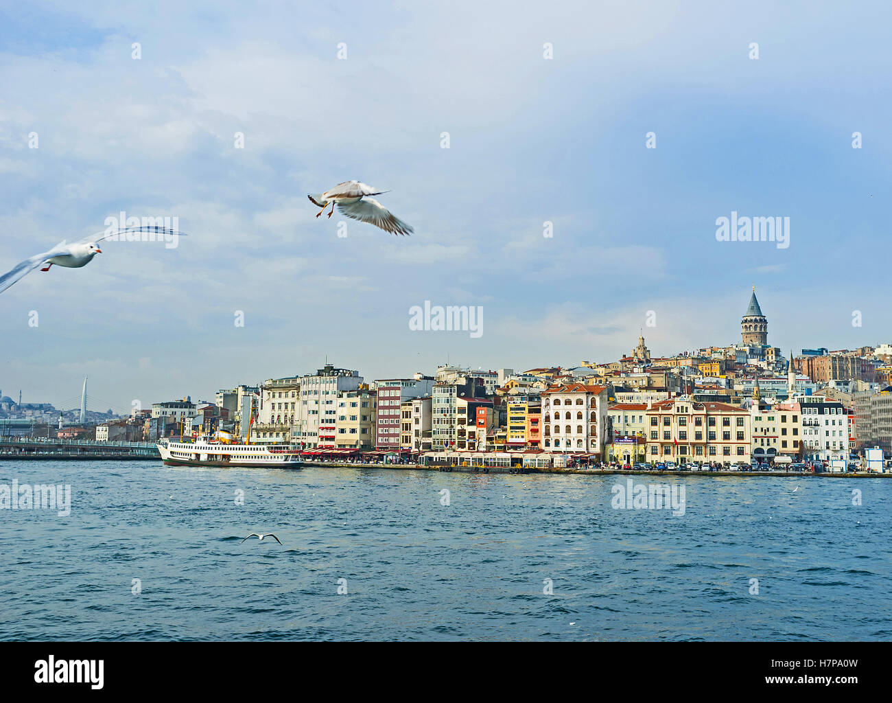The view on promenade of the Beyoglu district, topped by medieval ...