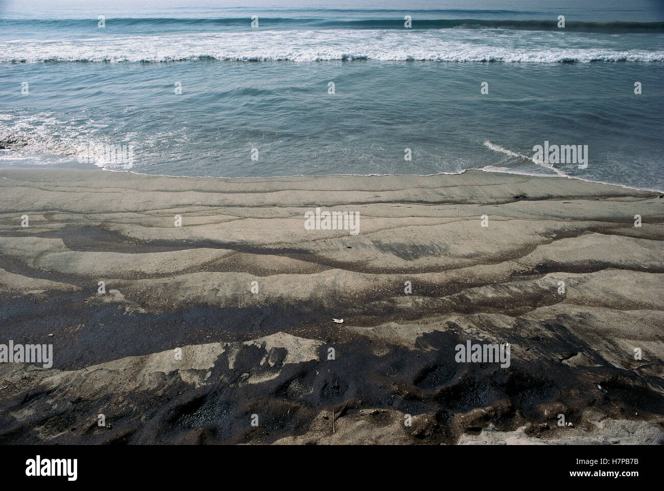 Oil spill on beach, Huntington Beach, California Stock Photo - Alamy