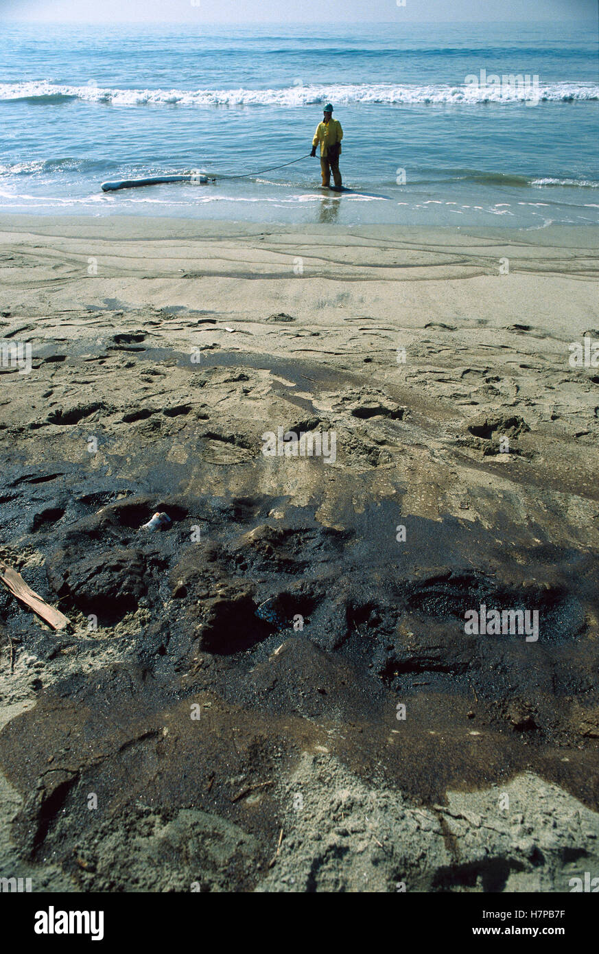 Oil spill on beach, Huntington Beach, California Stock Photo - Alamy