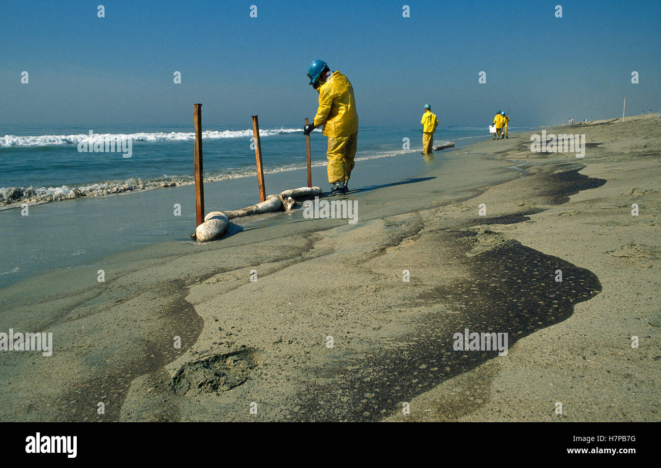 Oil spill clean up on beach, Huntington Beach, California Stock Photo ...