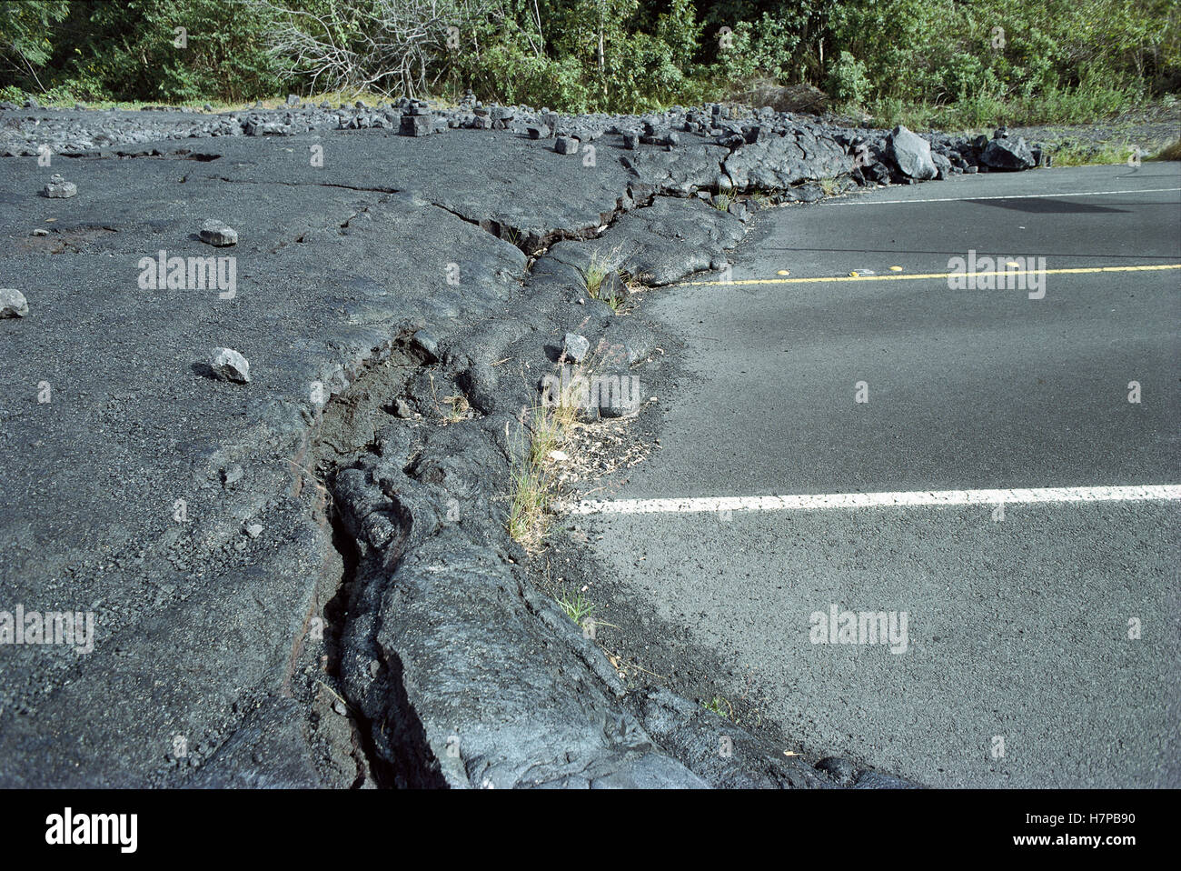 Lava flow over road, Hawaii Stock Photo - Alamy