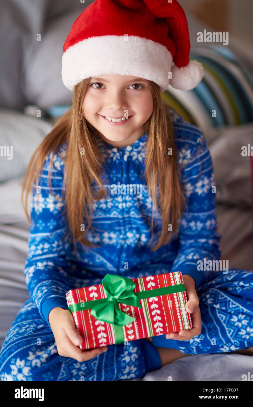 Little santa claus with Christmas gift Stock Photo - Alamy