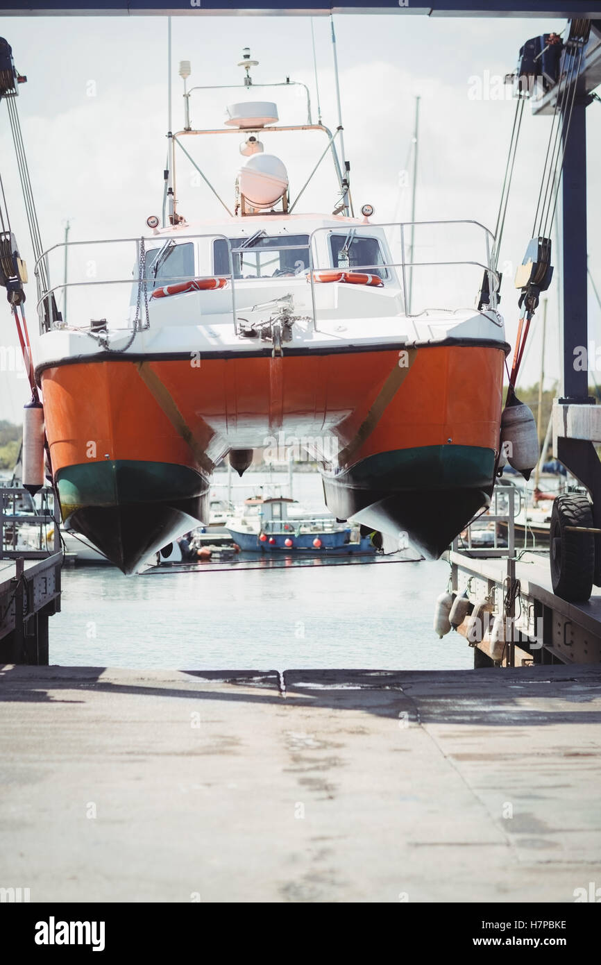 Hoist a boat hi-res stock photography and images - Alamy