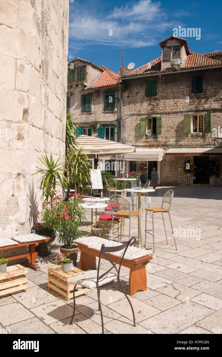 Outdoor pavement cafe in the old walled town of Split in Croatia Stock ...