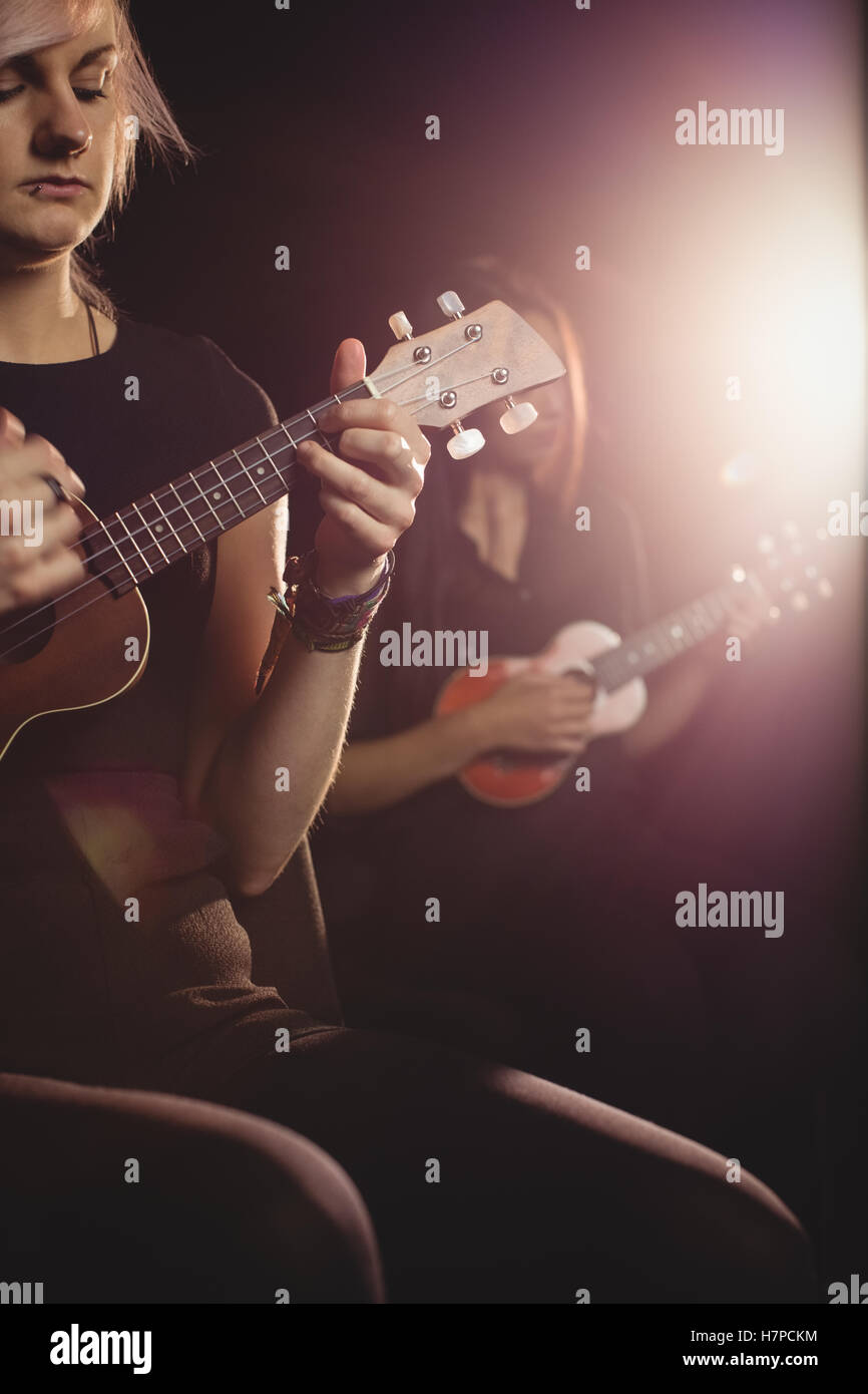 Women playing music hi-res stock photography and images - Alamy