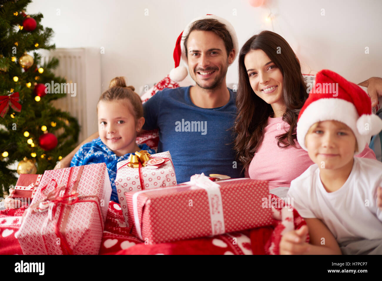 Portrait of happy family at Christmas Stock Photo - Alamy