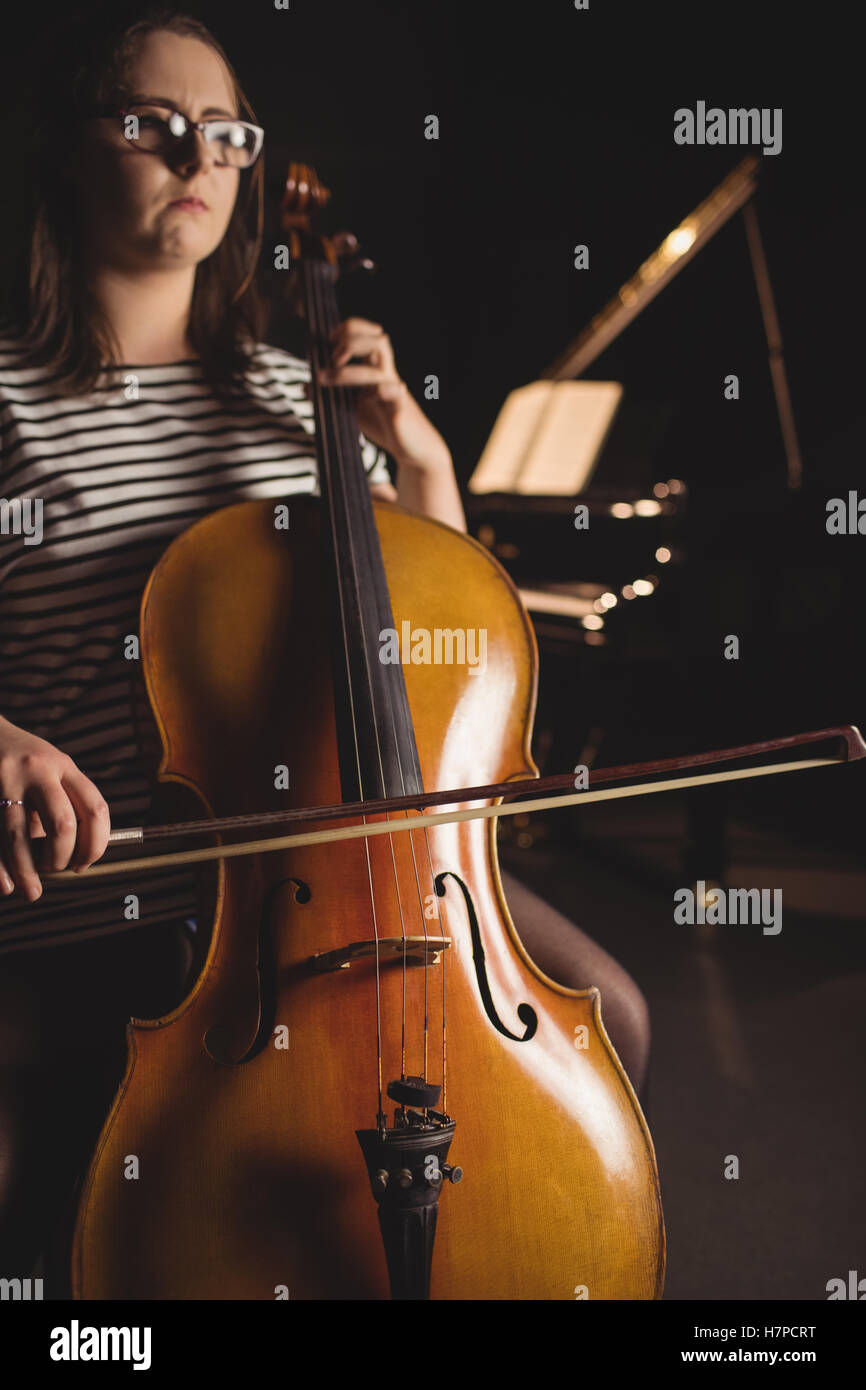 Female student playing double bass Stock Photo - Alamy