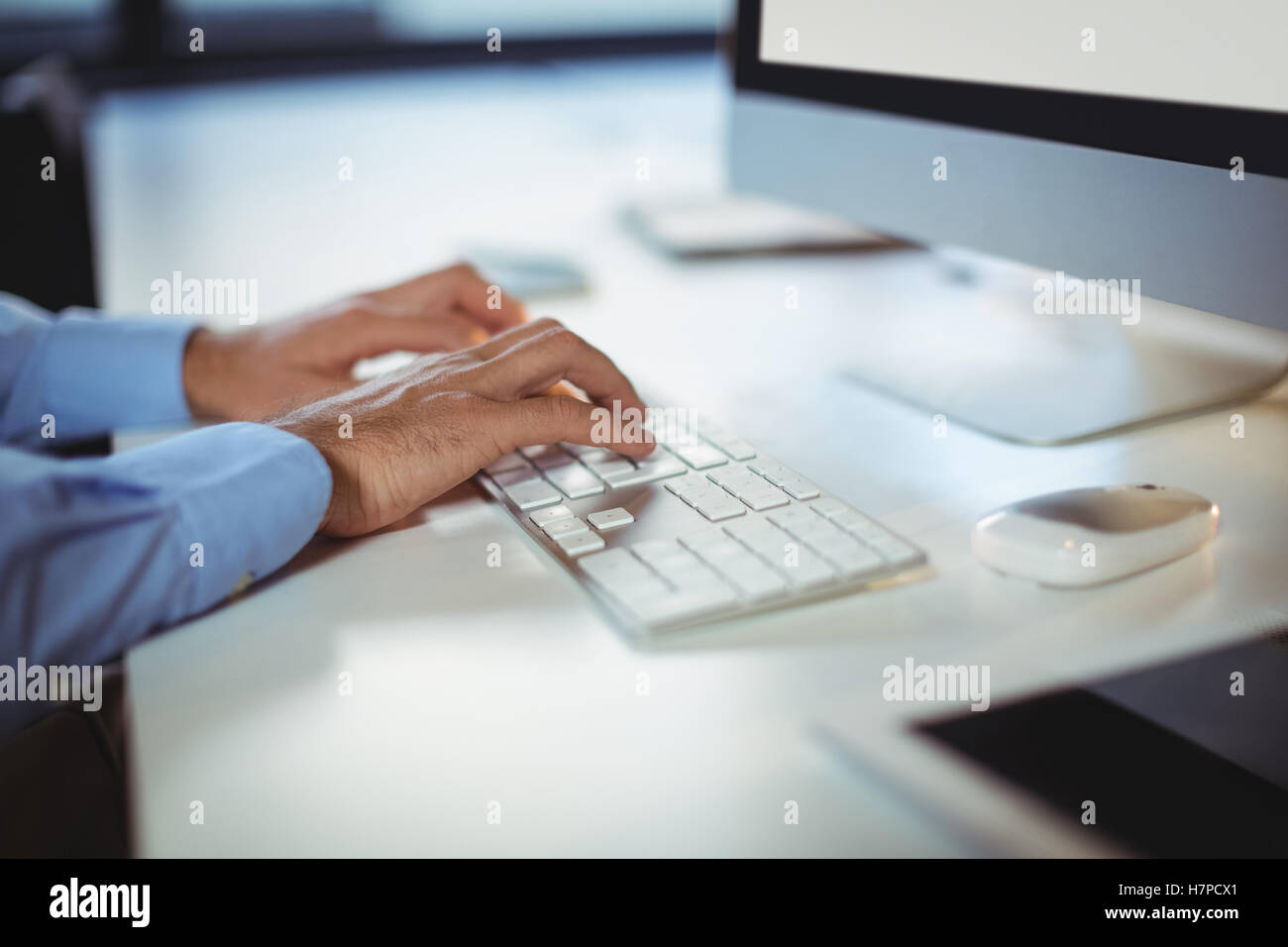 Hand of businessman using desktop pc Stock Photo - Alamy