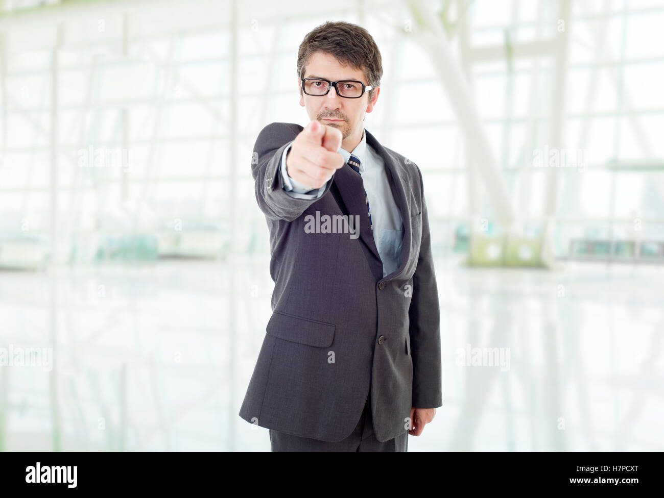 young business man pointing, at the office Stock Photo - Alamy