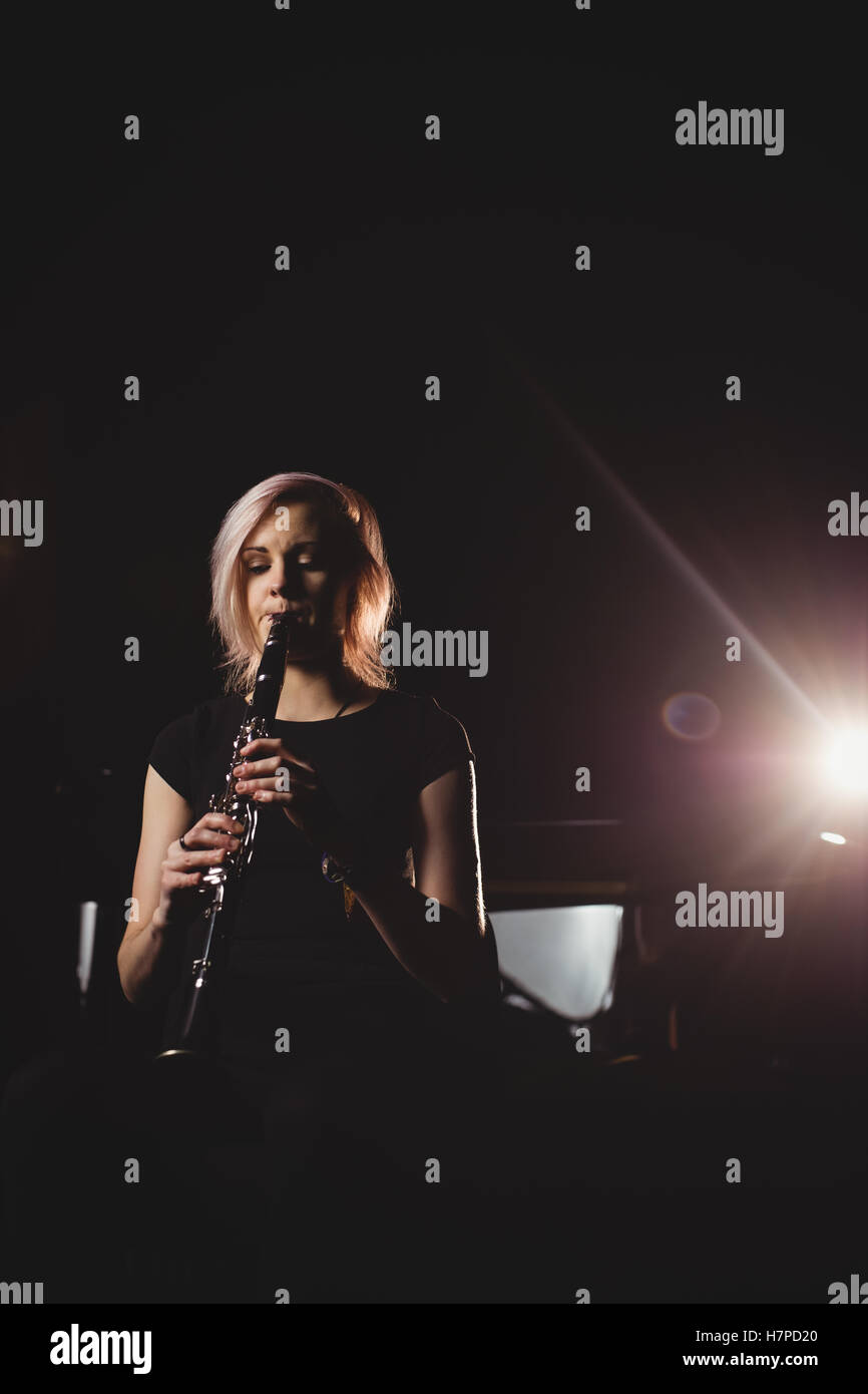 Woman playing a clarinet in music school Stock Photo - Alamy