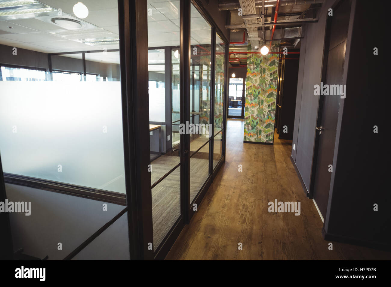View of office corridor and workspace Stock Photo - Alamy