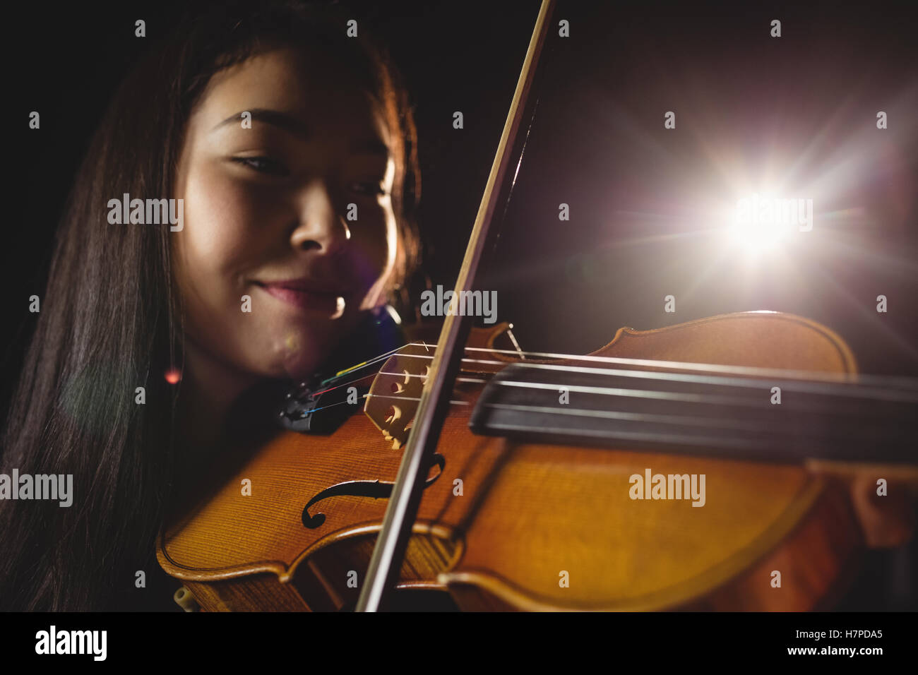 Female student playing violin Stock Photo - Alamy